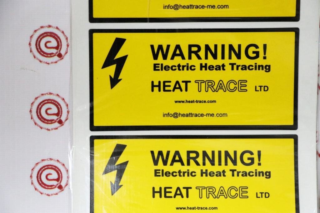 Предупредительная этикетка электрообогрева Heat Trace